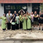 Ho Chi Minh City: Motorbike Street Food Tour with 12 Tastings - Stop 3: Iconic Dishes — Bánh Mì & Spring Rolls