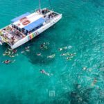 Montego Bay: Dunns Catamaran Sail & Snorkel with Zipline - Climbing Dunns River Falls: A Natural Wonder