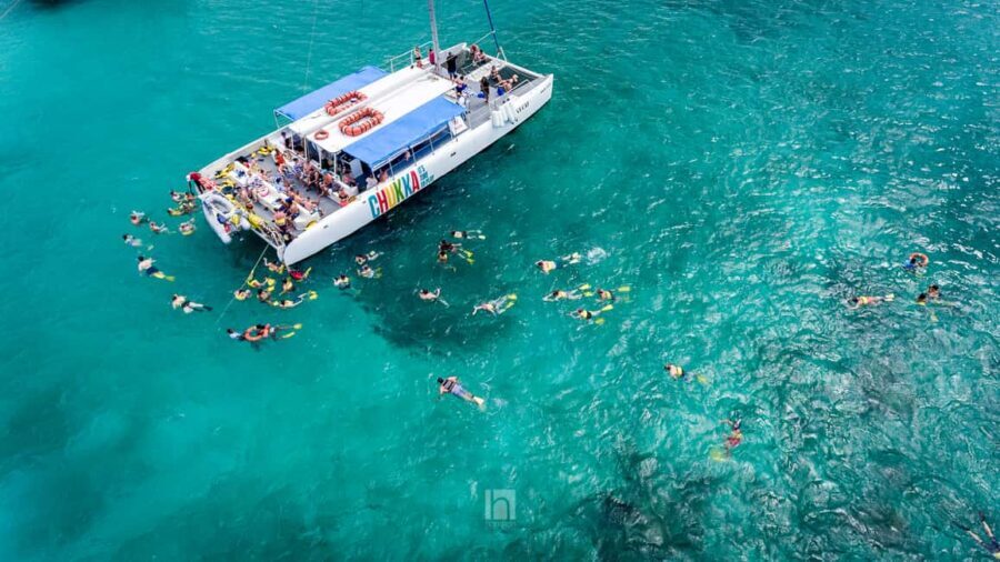 Montego Bay: Dunns Catamaran Sail & Snorkel with Zipline - Climbing Dunns River Falls: A Natural Wonder