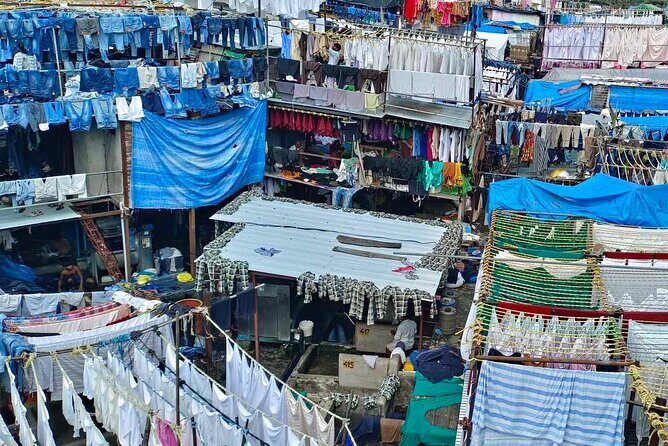 Mumbai Slum Tour with Dhobi Ghat Laundry & Train Ride Tour - Exploring Mumbais Hidden Layers: The Itinerary