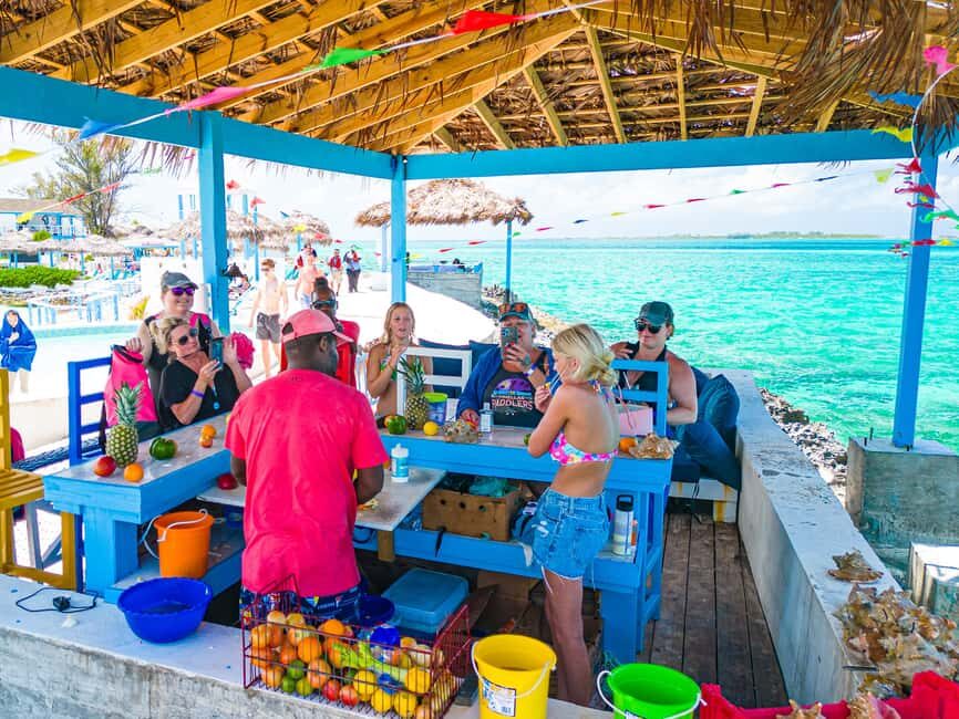 Nassau: SNUBA Diving Island Cruise with Bahamian Lunch - Transportation, Group Size, and Duration