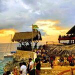 Negril 7 miles beach day & Parasailing then Rick's cafe chill - Authentic Experiences That Make This Tour Stand Out
