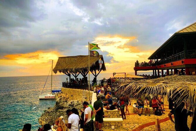 Negril 7 miles beach day & Parasailing then Rick's cafe chill - Authentic Experiences That Make This Tour Stand Out