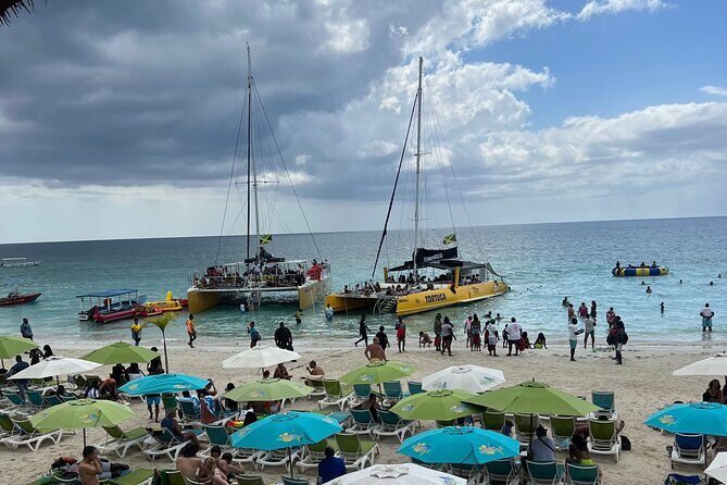 Negril Private Day Tour: ATV Ride, Party Catamaran & Ricks Cafe - The Iconic Seven Mile Beach