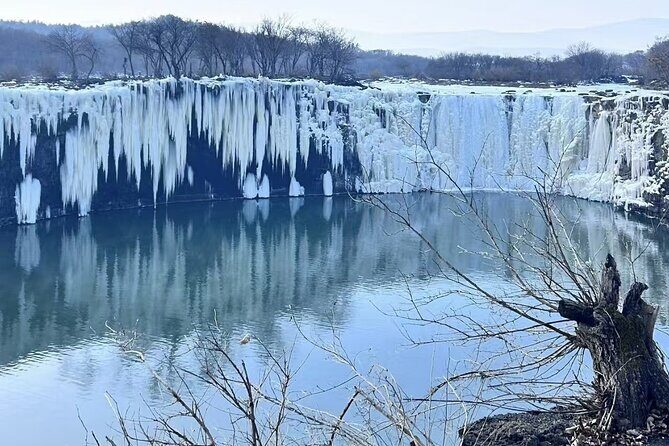 One Day Harbin Winter Expedition Jingpo Lake Sunrise and Fishing - Exploring Diaoshuilou Waterfall in Winter