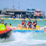 Pattaya: Coral Island Speedboat Tour with Indian Buffet - Coral Island: Sun, Sand, and Water Sports