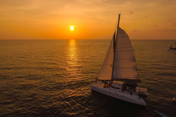 Romantic Phomthep and Coral Island Sunset Tour by Yacht Catamaran - The Sum Up