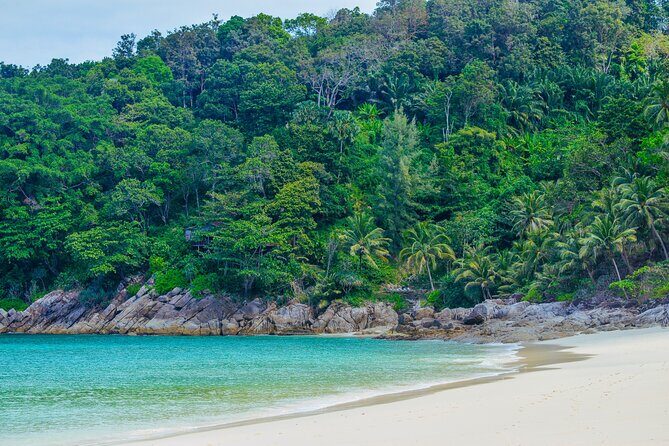 Round Trip Long Tail Boat Service to Freedom Beach - Arriving at Freedom Beach: A Hidden Paradise