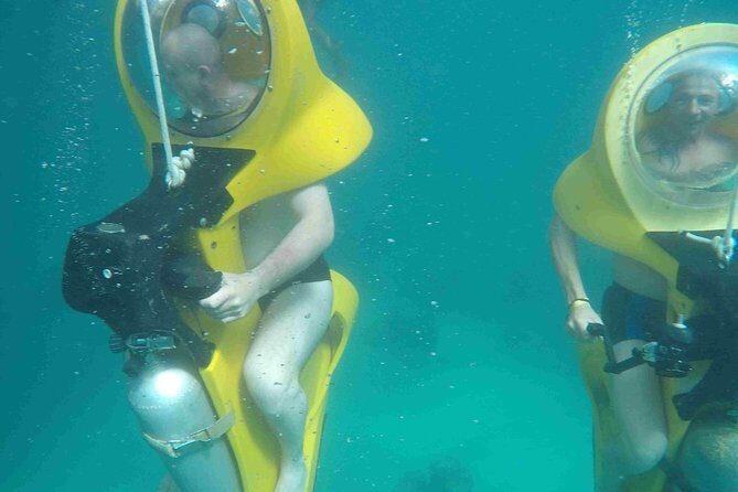 Scuba Doo Diving Scooters in Punta Cana - The Journey to the Reef: The Glass-Bottomed Boat