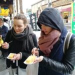 Tokyo: Tsukiji Fish Market Food & Walking tour by "Real Insider" - Walking through Tsukiji Jogai Market