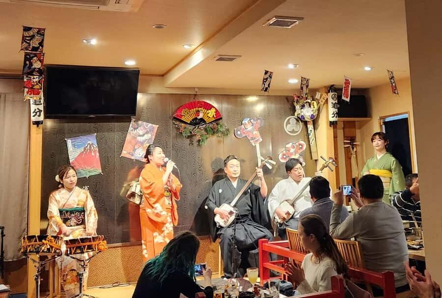 Tsugaru shamisen performance over traditional dinner - The Asakusa History & Panorama Tour
