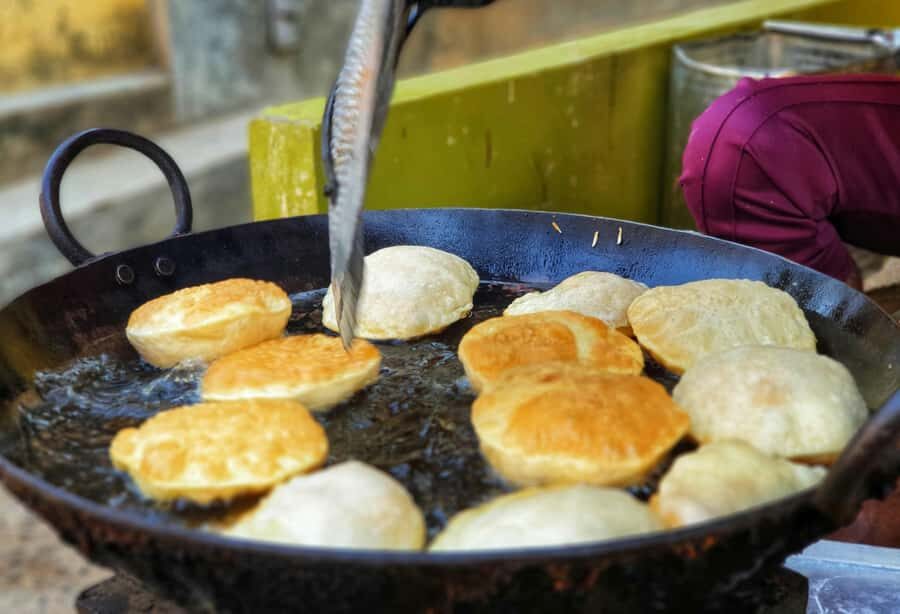 Varanasi: Private Street Food Tour with 8+ Tastings & Pickup - Sampling the Classics: Kachori Sabzi and Tamatar Chaat