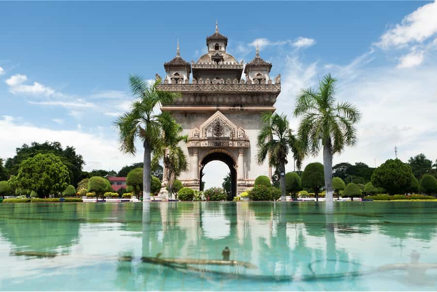 Vientiane: Full-Day Sacred Blessings and Temples Tour - Tasting Lao Cuisine