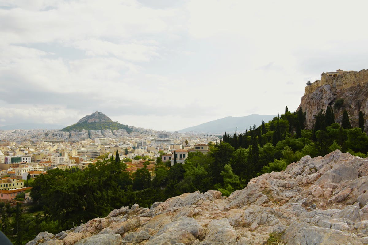 The Acropolis of Athens seen from a distance with the city below