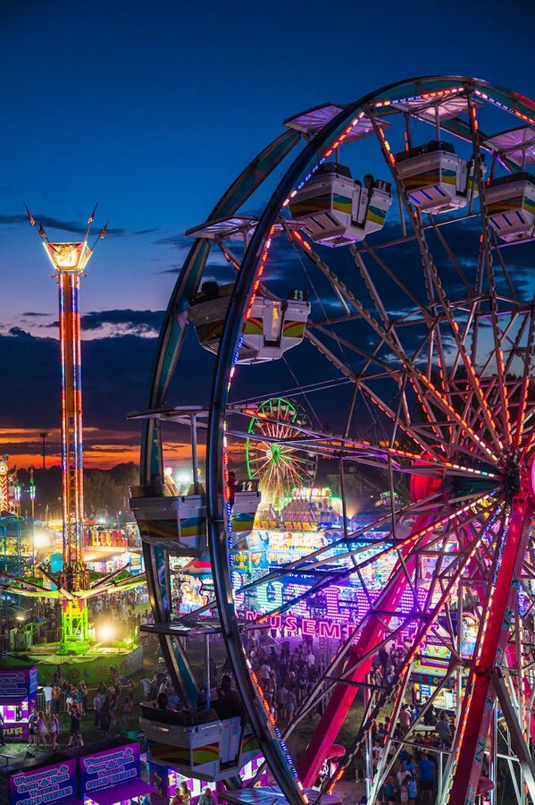 Amusement park glowing at night