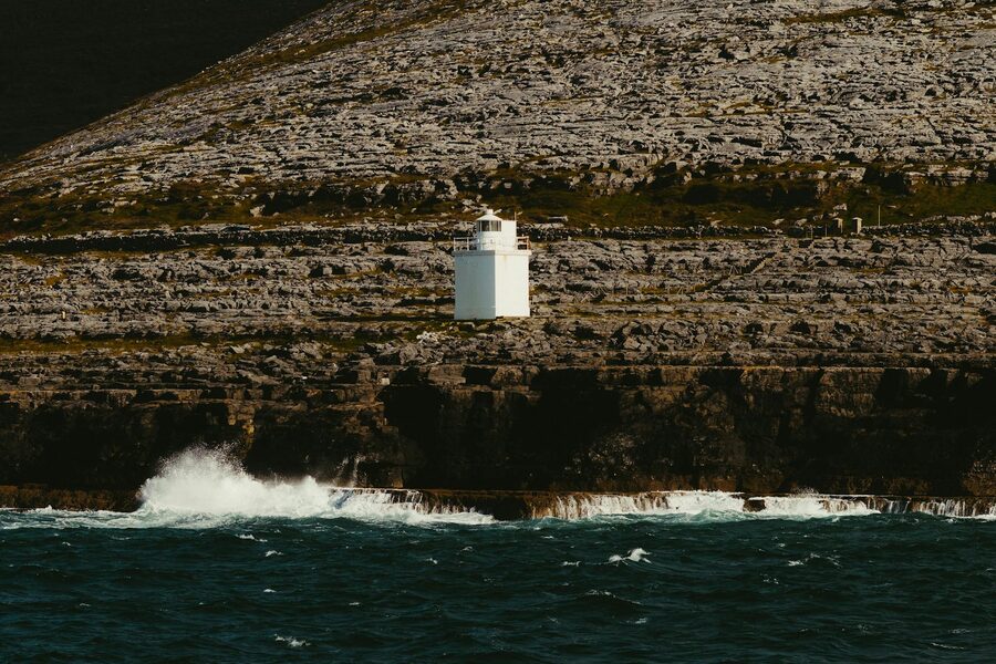 Lighthouse on the rocky coast of Inishmore
