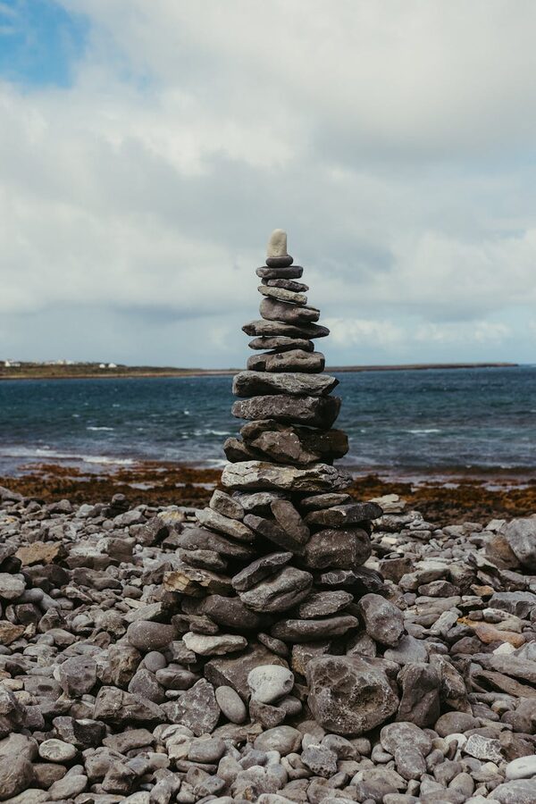 Stone cairn on a rocky beach on Inishmore