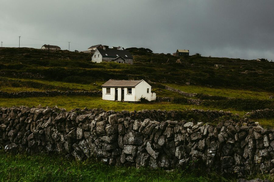 Stone cottages and green fields on the Aran Islands