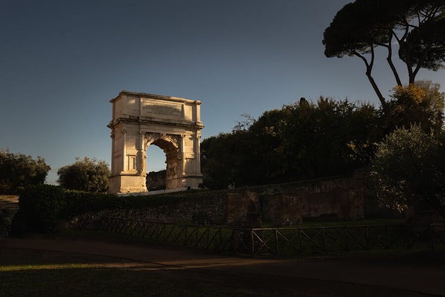 Arch of Titus at dusk in the Roman Forum