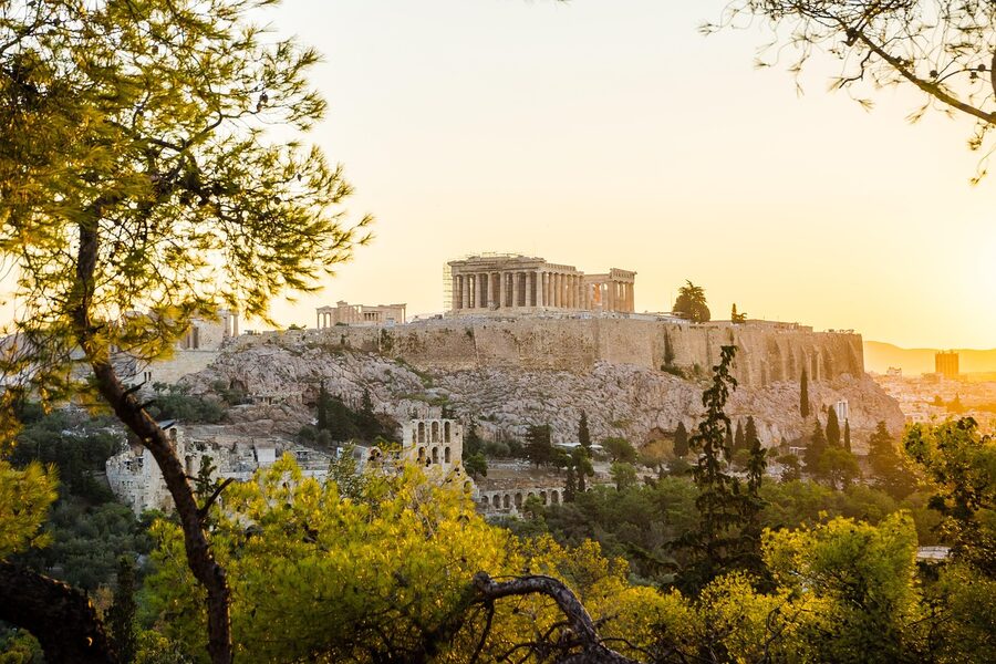 Athens cityscape with the Acropolis illuminated at sunset