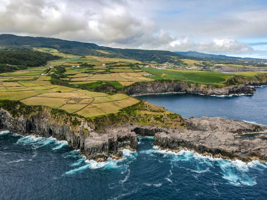 Azores coastal cliffs lush farmland aerial