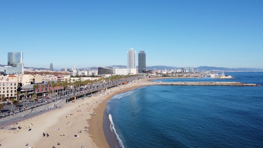 Barcelona beach with city skyline behind