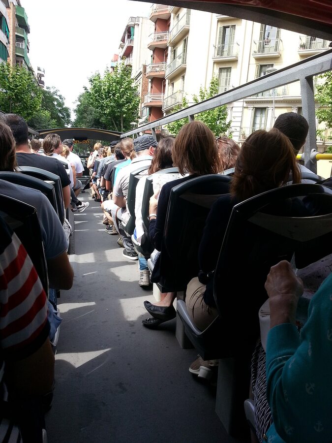 Barcelona Bus Turístic pulling up on a city street