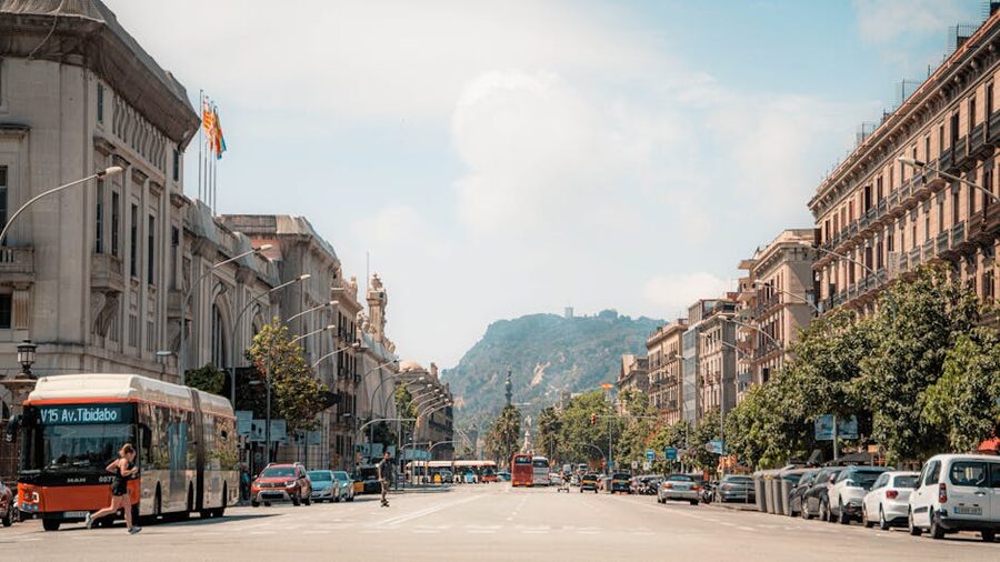 Barcelona street with classic architecture and traffic