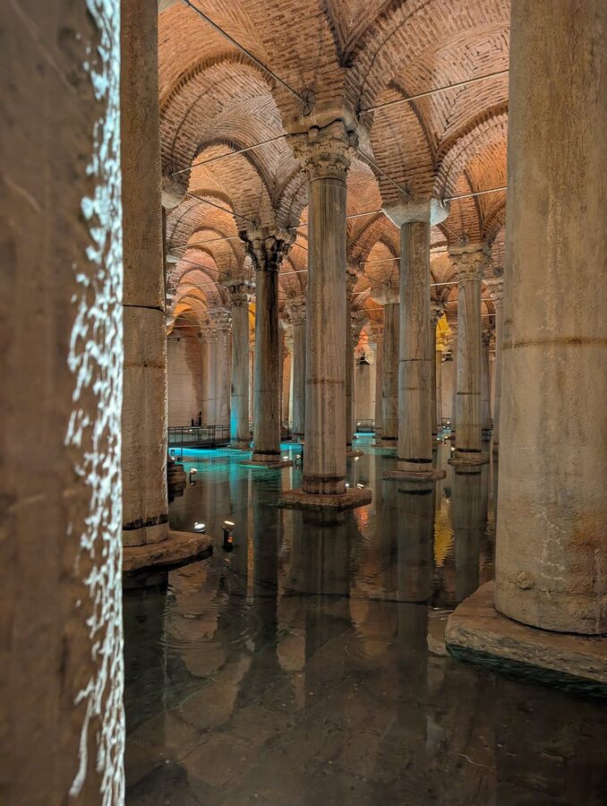Columns perfectly reflected in the still water of the Basilica Cistern in Istanbul