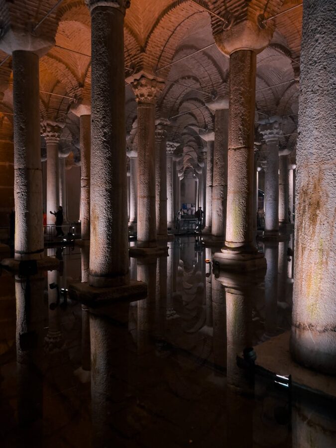 Dimly lit ancient columns deep inside the Basilica Cistern