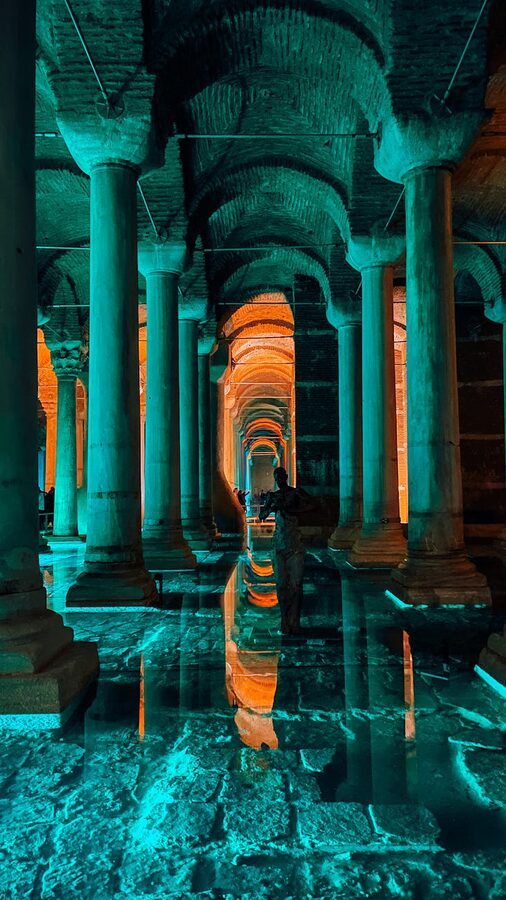 Illuminated walkway and arches inside the Basilica Cistern