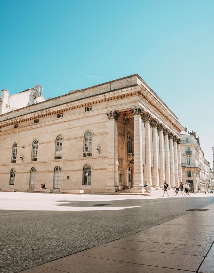 Neoclassical theatre building with Corinthian columns in a sunny Bordeaux cityscape