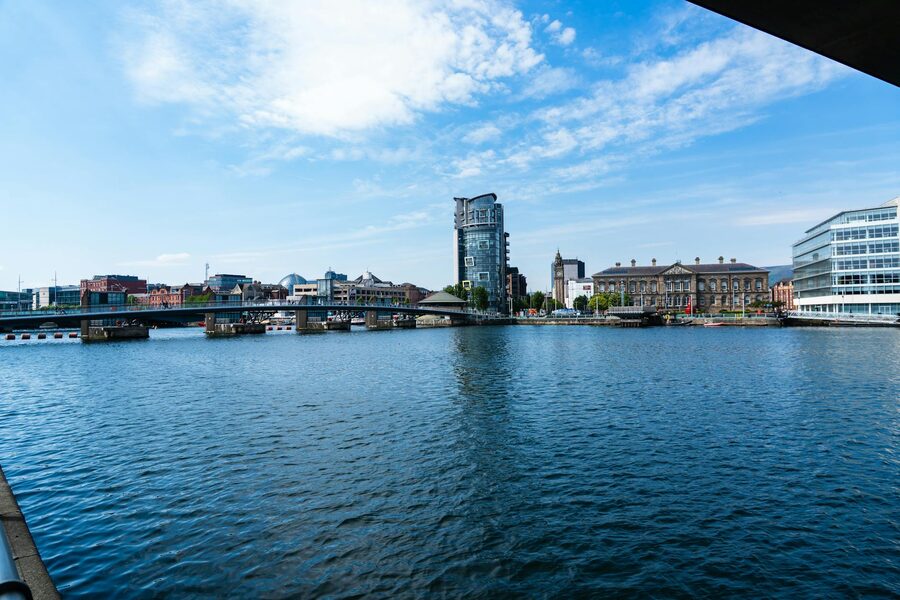 River Lagan with Belfast skyline showing modern and historic buildings