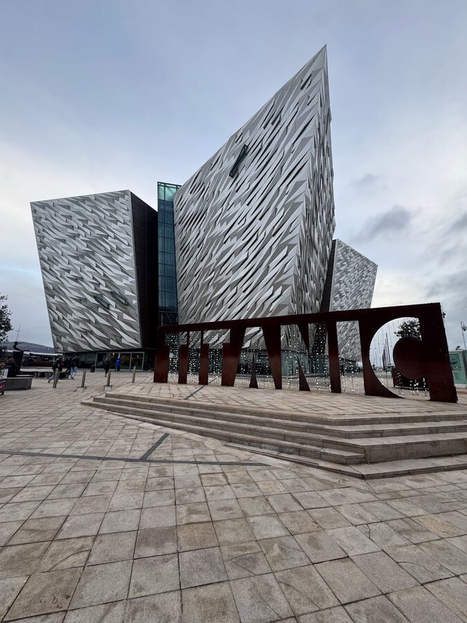 Titanic Belfast museum with its distinctive angular architecture and Titanic sign