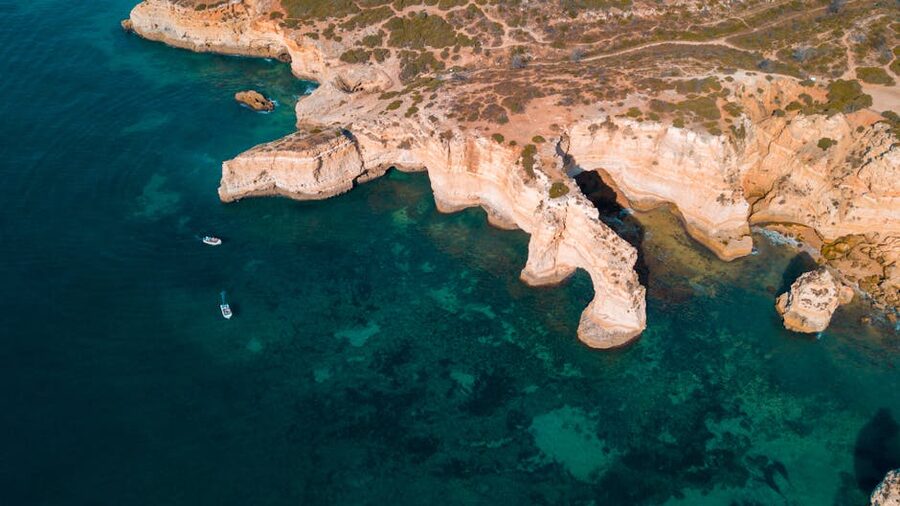 Aerial view of boats along the Algarve cliff coast near Benagil