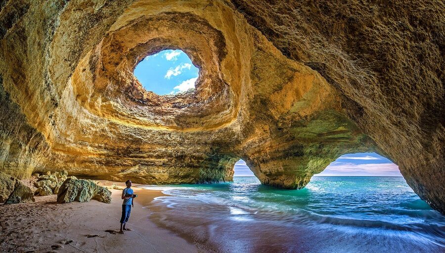 View from inside Benagil Cave looking out through the rock gate to the sea