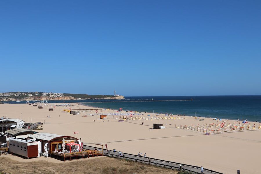 Portimão beach and waterfront with golden sand and blue ocean