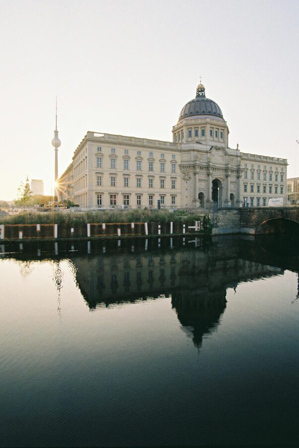 Museum Island buildings reflecting in the Spree River at sunrise in Berlin