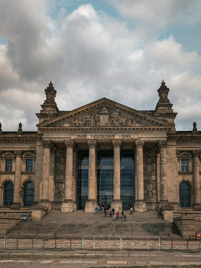 The grand Reichstag building in Berlin showing classical architecture