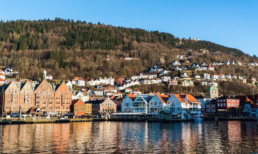 Bryggen harbour area in Bergen with boats on the water