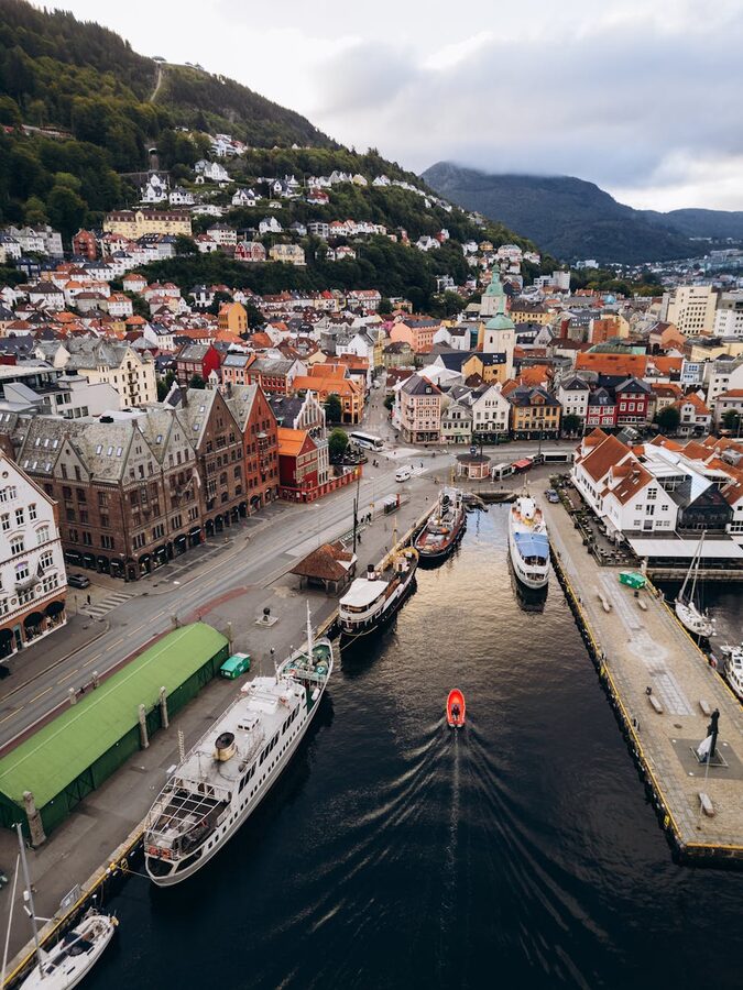 Bergen harbour with historic architecture and mountains in background
