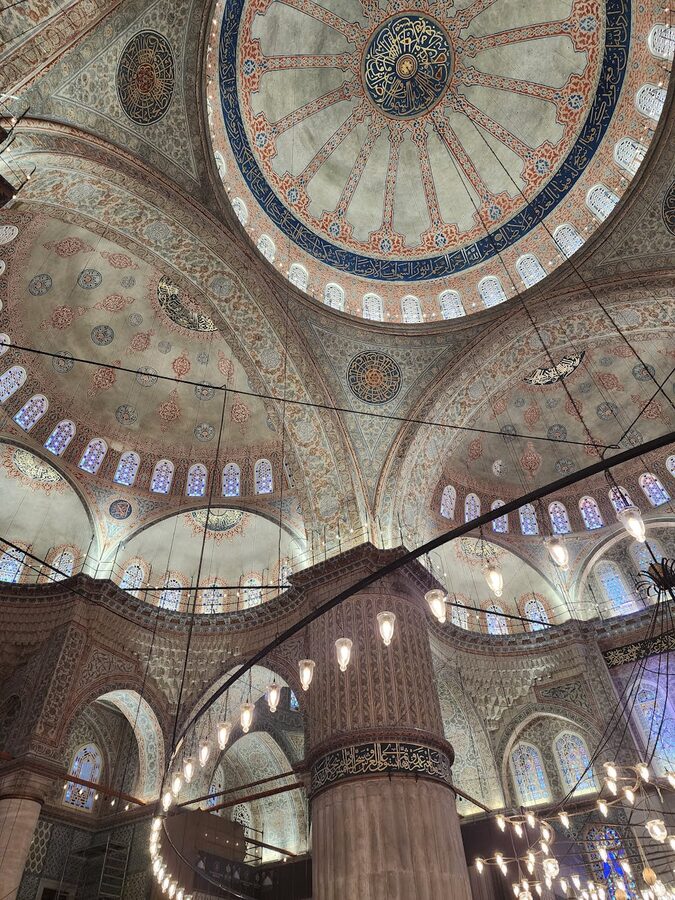 Intricate Islamic ceiling details inside the Blue Mosque Istanbul
