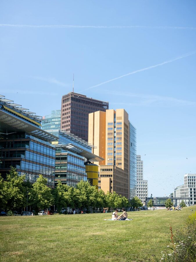Modern buildings and green space in Berlin on a sunny day