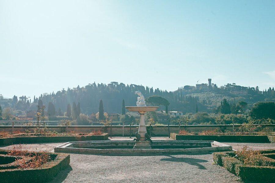 Old stone fountain with statue at Boboli