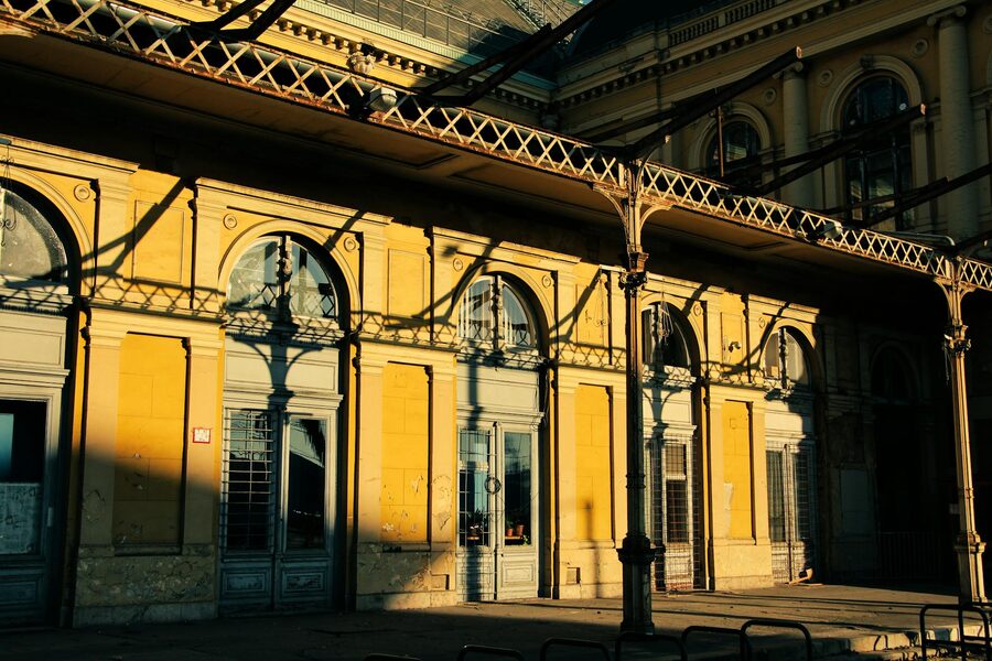 Historic building facade in Budapest with sunlight and shadows