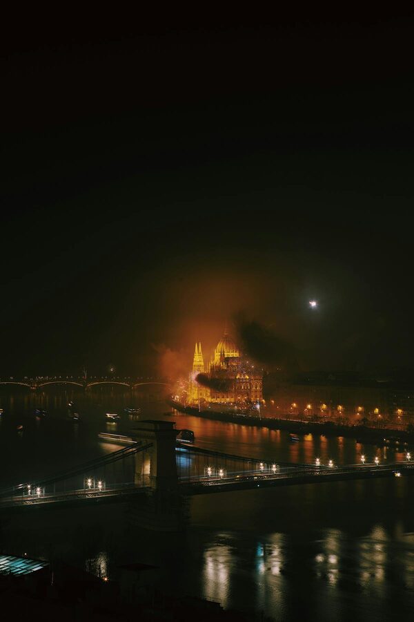 Chain Bridge in Budapest lit up at night over Danube