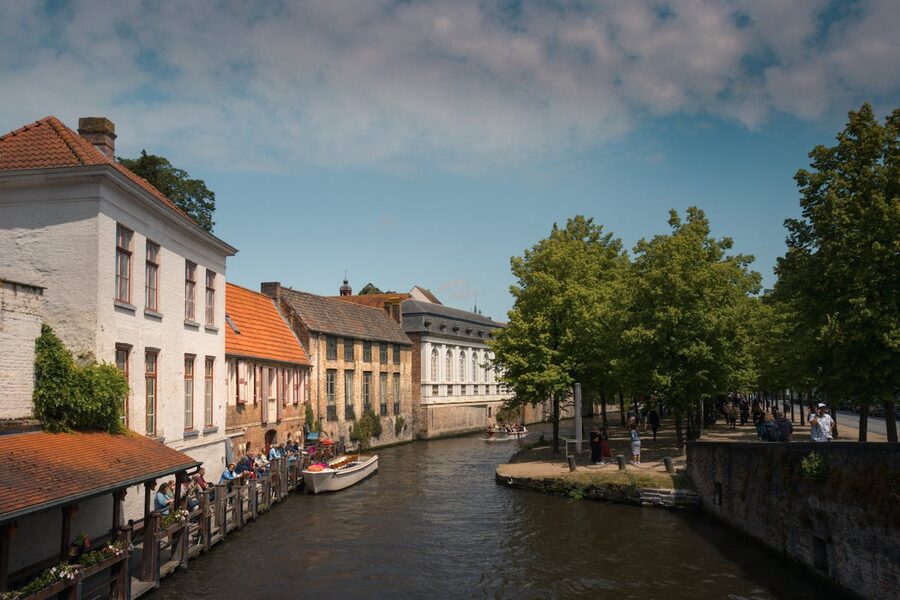 Bruges canal with bridge and reflections