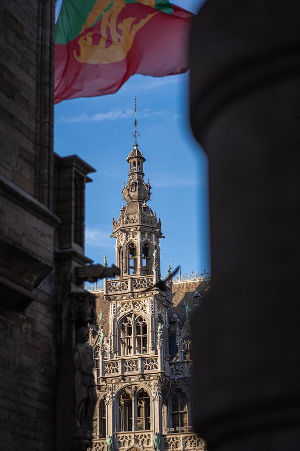 Gothic tower in Brussels under blue sky