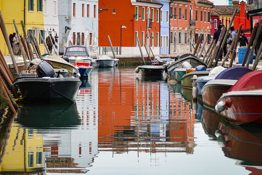Burano houses reflected in a canal