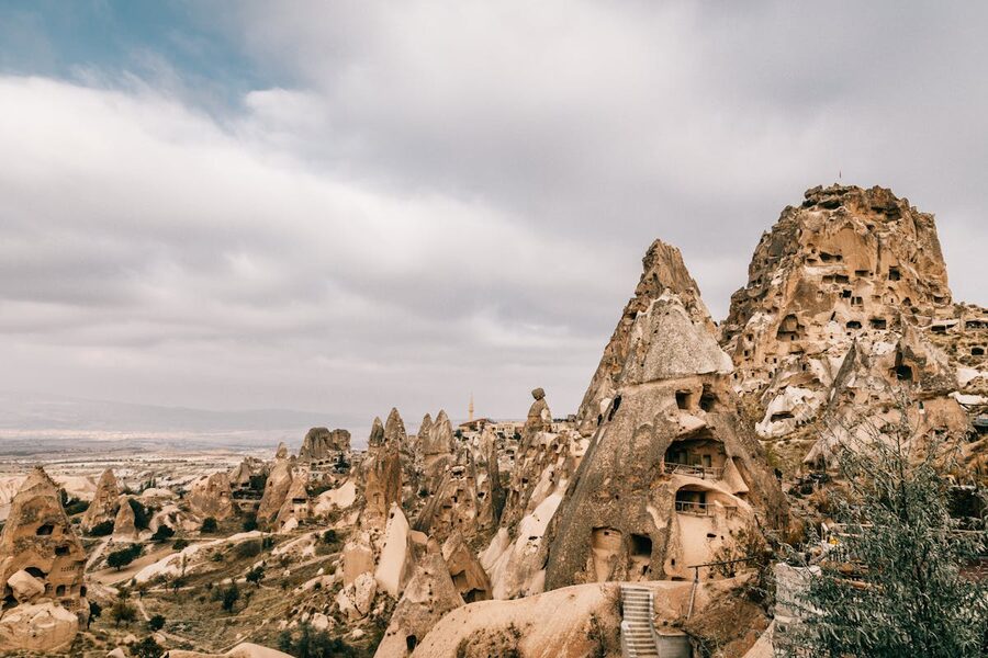 Ancient cave houses carved from volcanic rock formations in Cappadocia